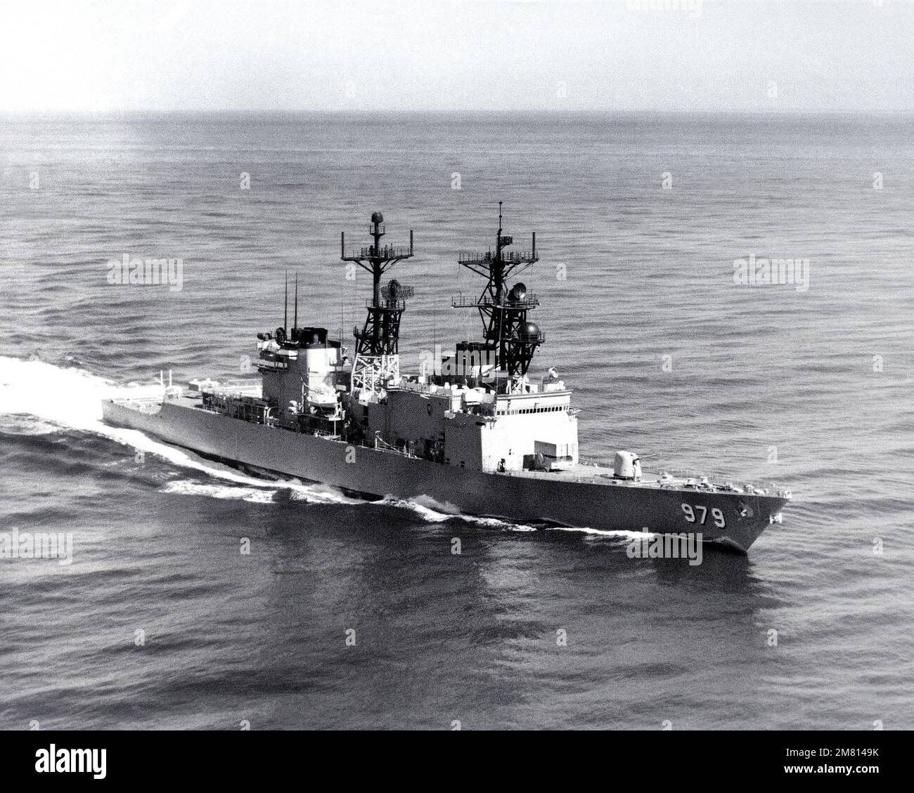 An aerial starboard bow view of the "Spruance" class destroyer USS ...