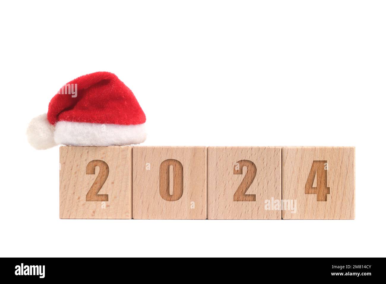 Wooden cubes with Santa hat and numbers 2024 white background Stock ...