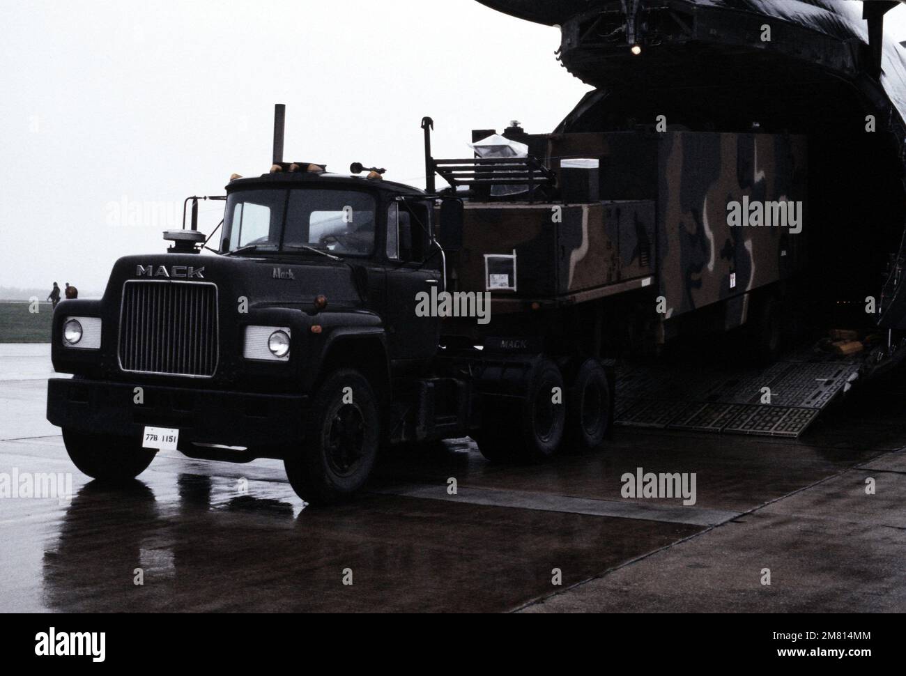 A Ground Launch Cruise Missile Launch Control Center is offloaded from ...