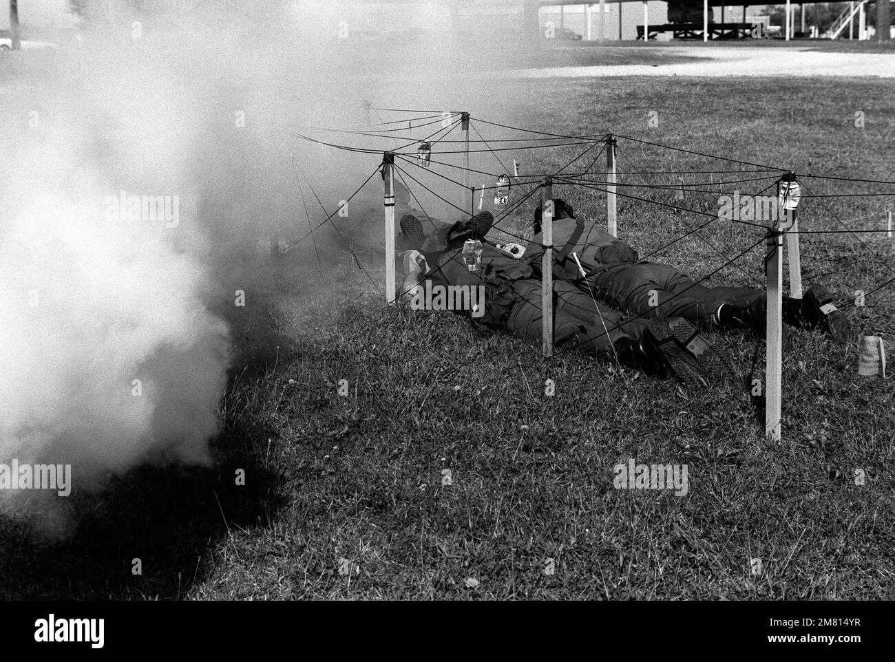 US Air Force clinic personnel maneuver a stretcher-borne "casualty ...