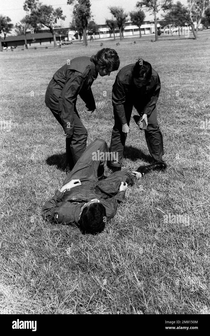 Captain (Dr.) April McVey, right, CHIEF of Aeromedical Services for the ...