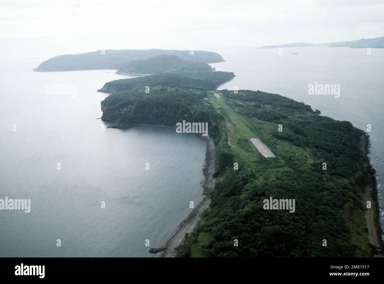 An aerial view of Corregidor Island showing the grass strip runway with ...