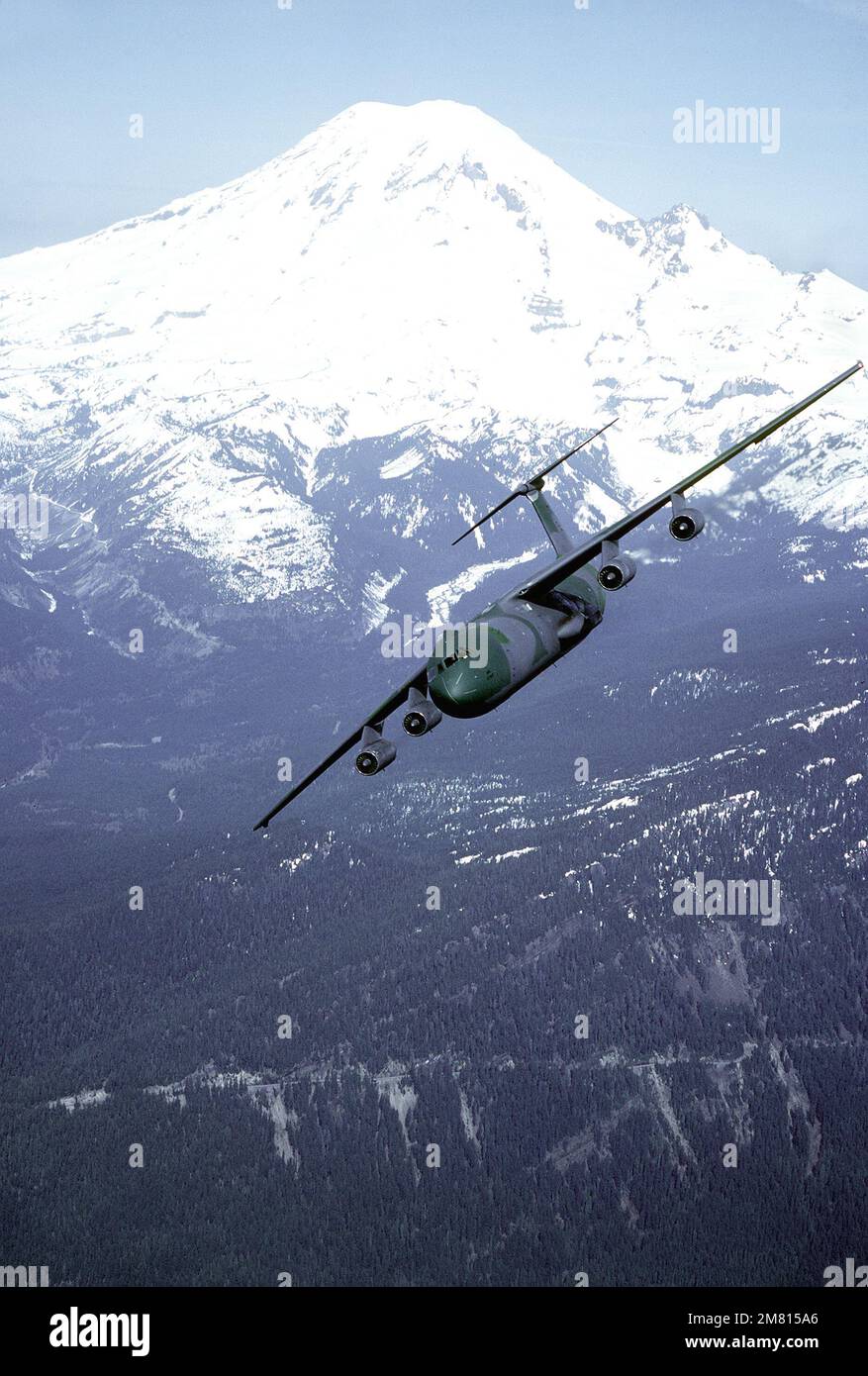 An air-to-air front view of a C-141 Starlifter aircraft from the 62nd ...