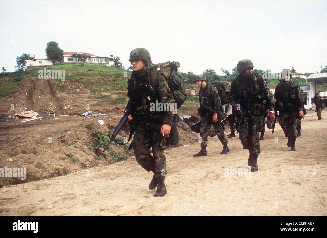 Members of the 82nd Airborne Division head out on patrol during ...