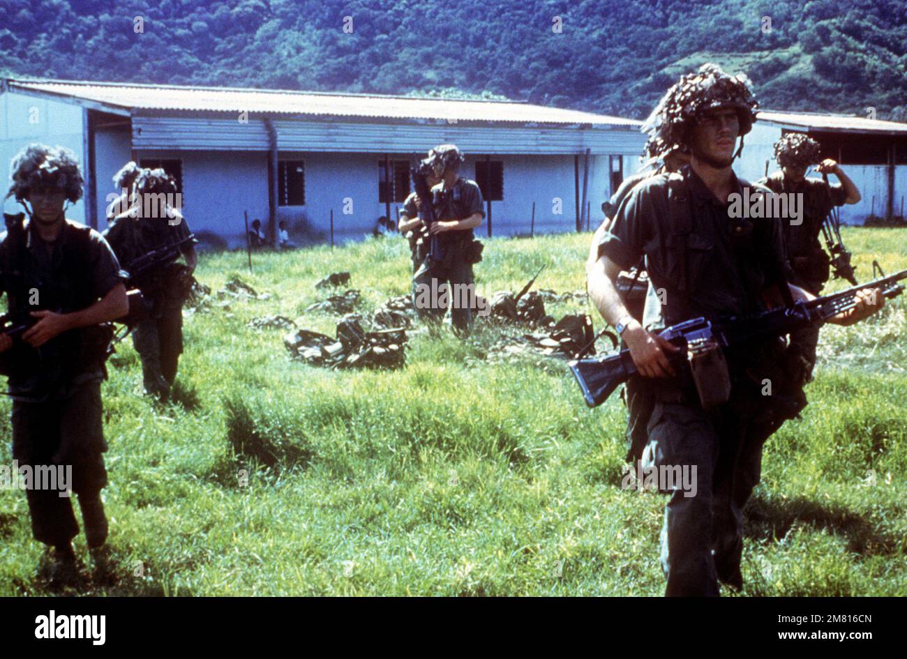 Members of the 82nd Airborne Division prepare to go out on patrol ...