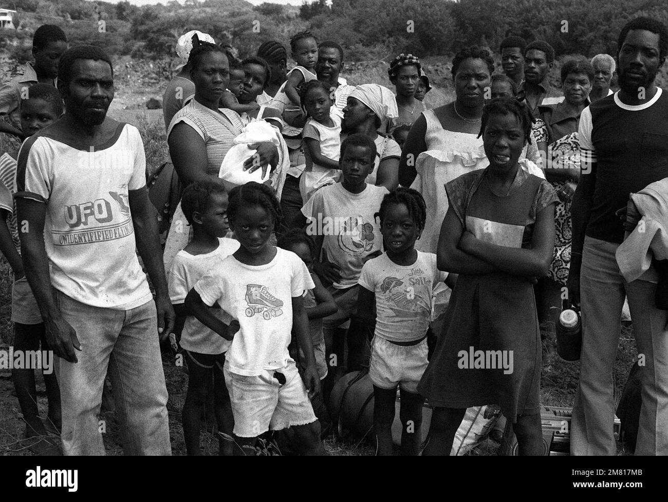 A group of Grenadians near Point Salines Airfield during the ...