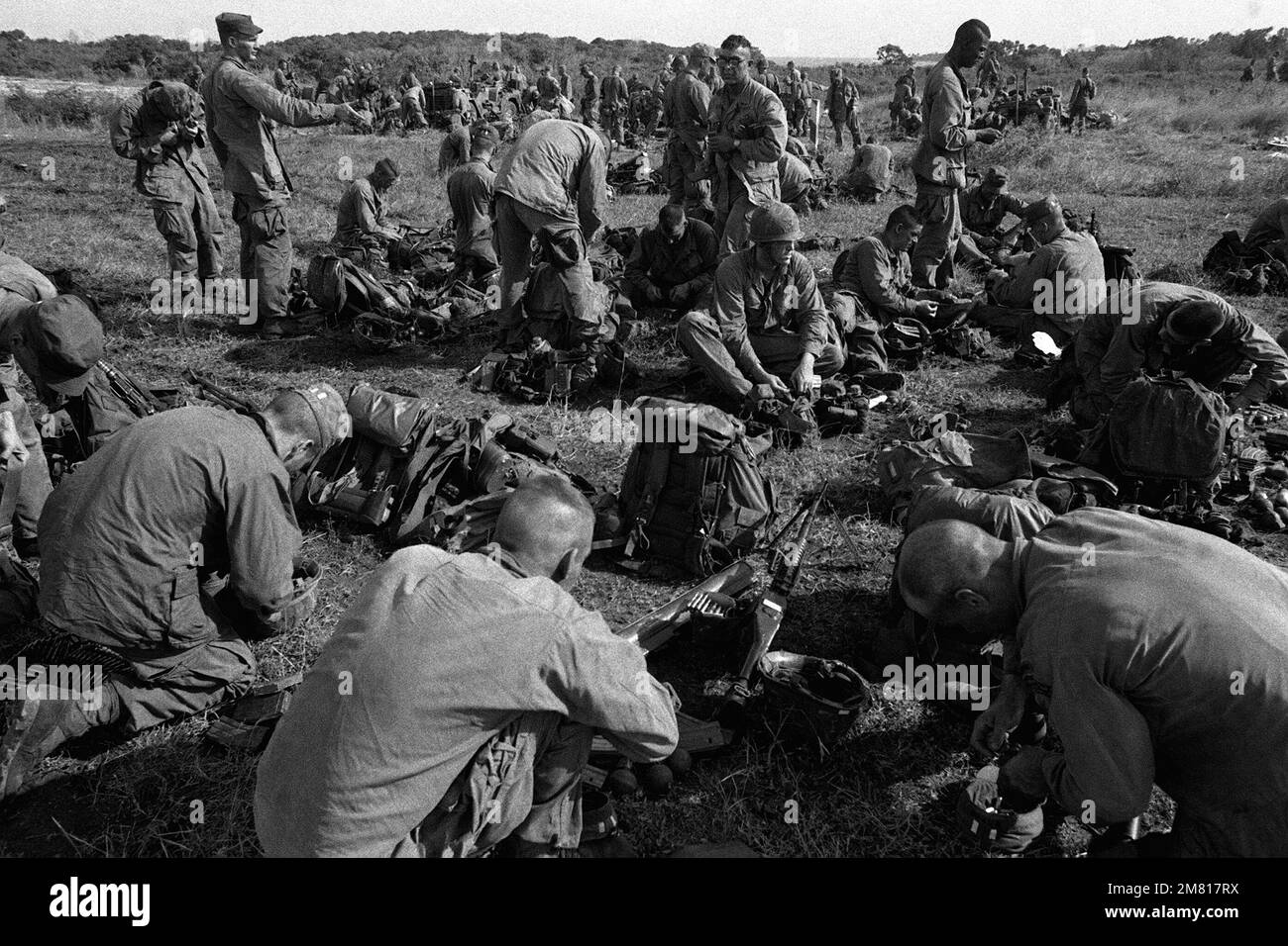 A group of US Army Rangers gather their gear at Point Salines Airfield ... A group of US Army Rangers gather their gear at Point Salines Airfield ...