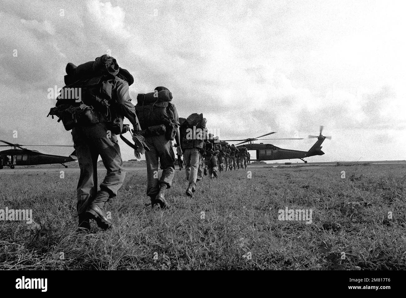 Members of the Eastern Caribbean Defense Force board a US Army UH-60 ...
