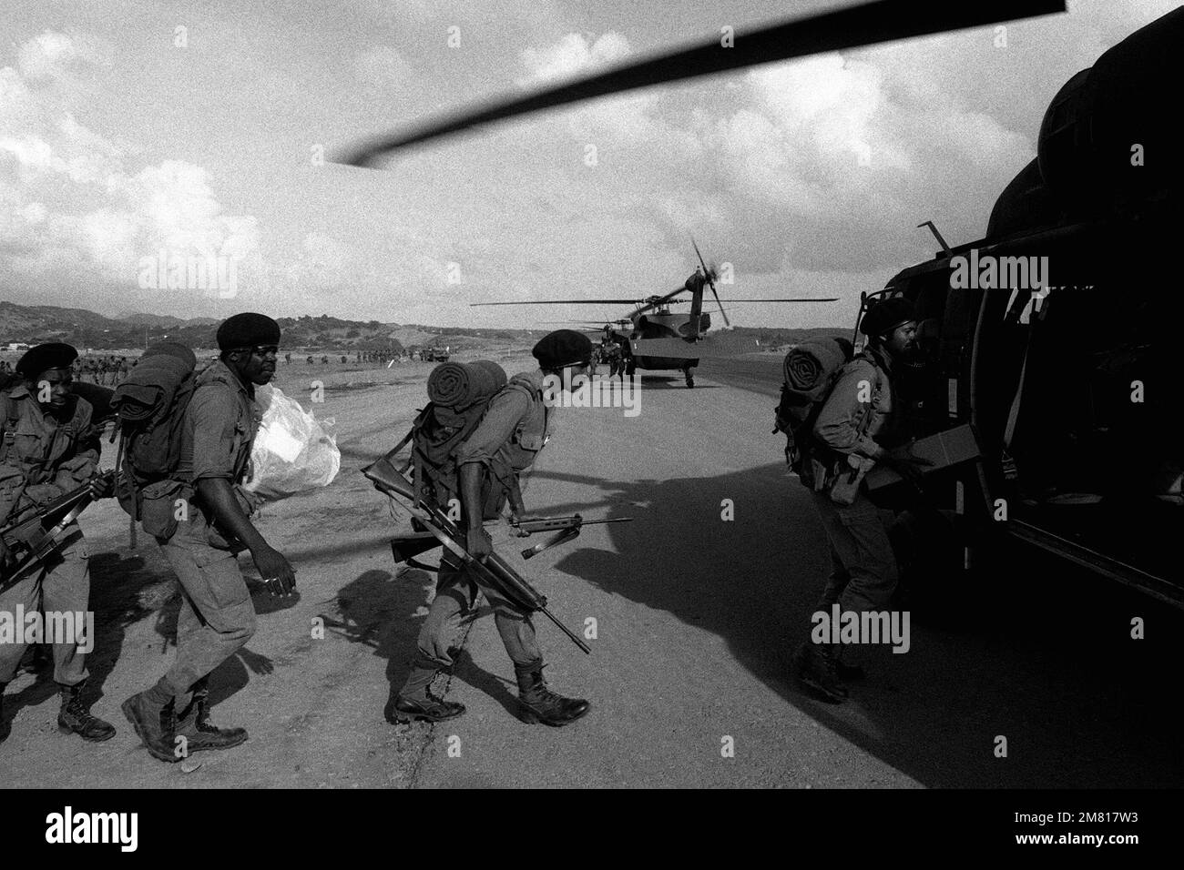 Members of the Eastern Caribbean Defense Force board a US Army UH-60 ...