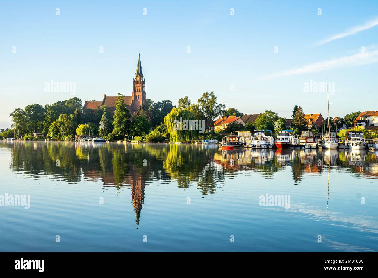 A beautiful scenery of lake Muritz with a reflection of Robel city ...