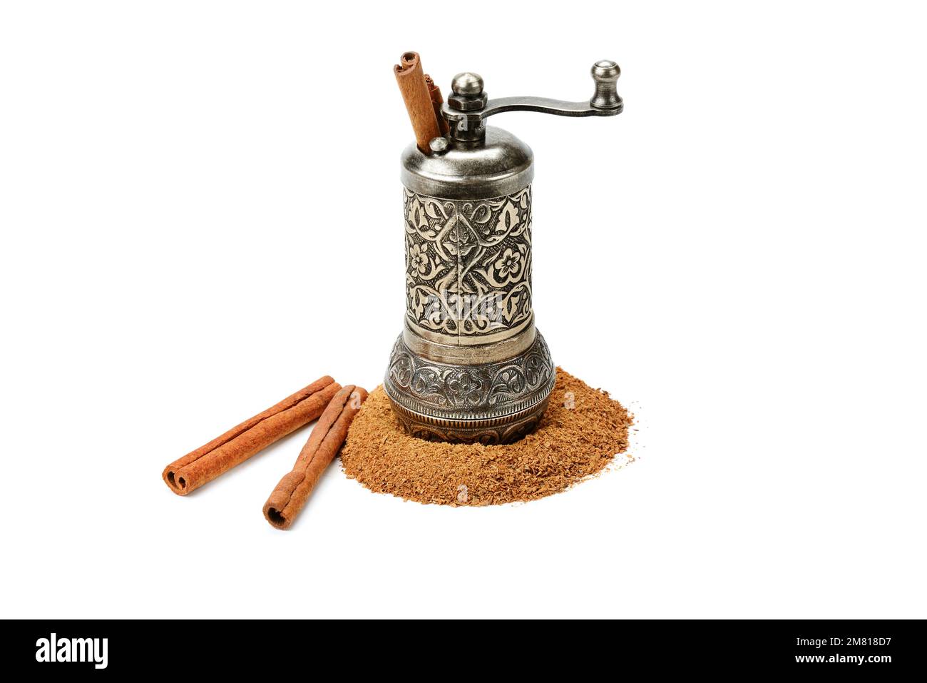 Cinnamon and manual grinder isolated on white background Stock Photo ...