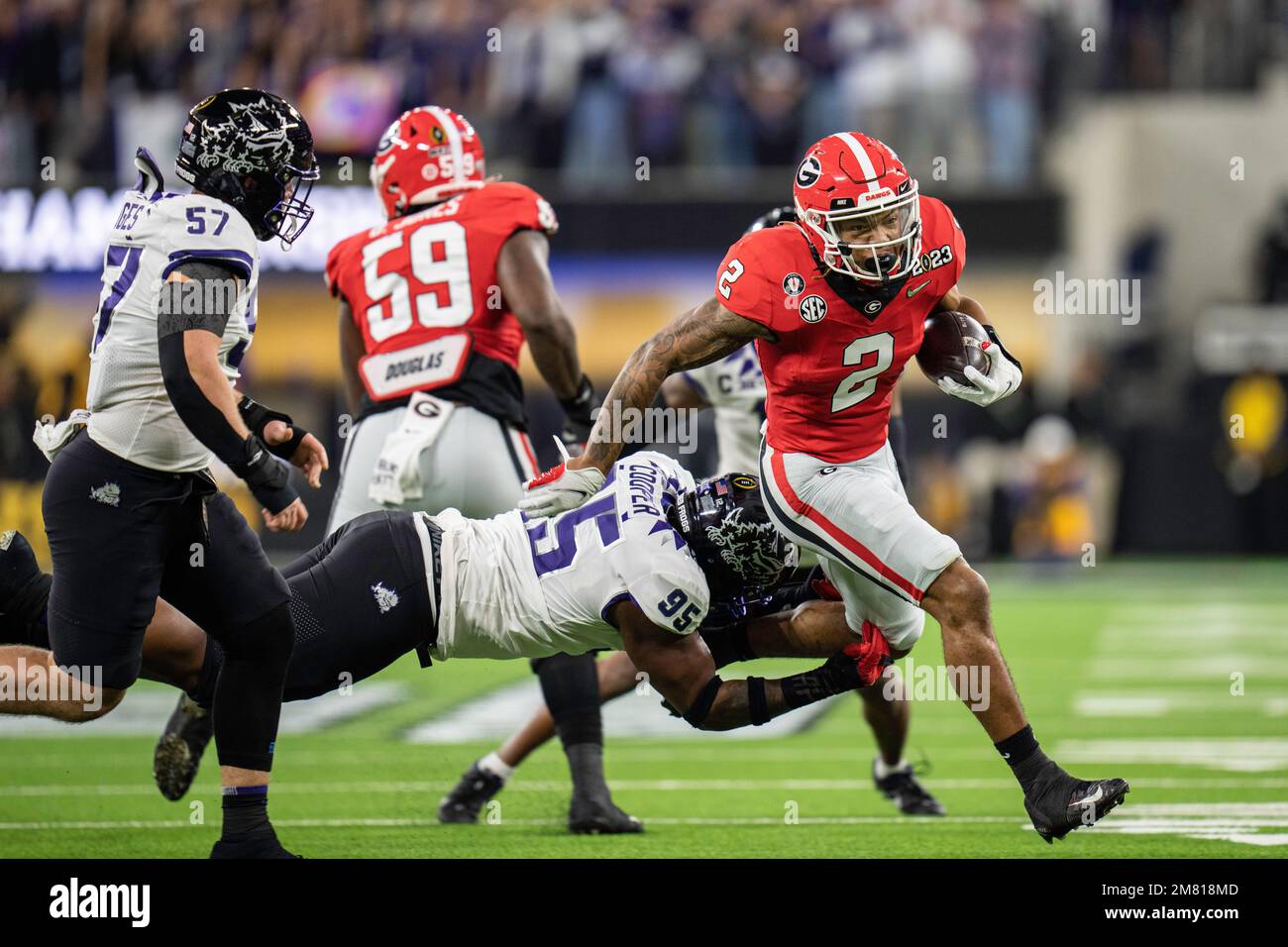 Georgia Bulldogs running back Kendall Milton (2) runs the ball as TCU ...