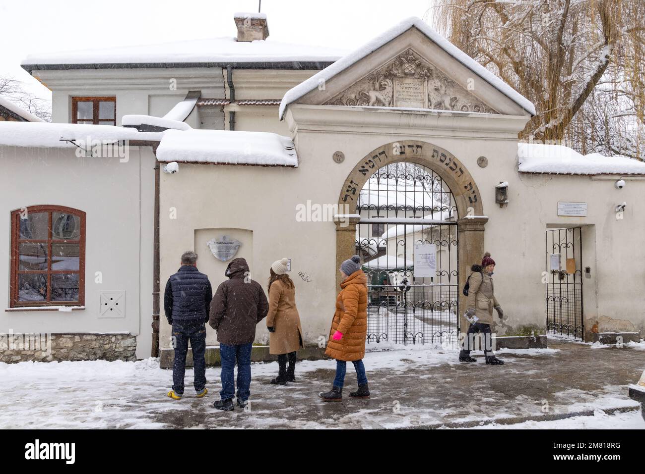 The Remuh Synagogue, Krakow - Visitors at the entrance and exterior of ...