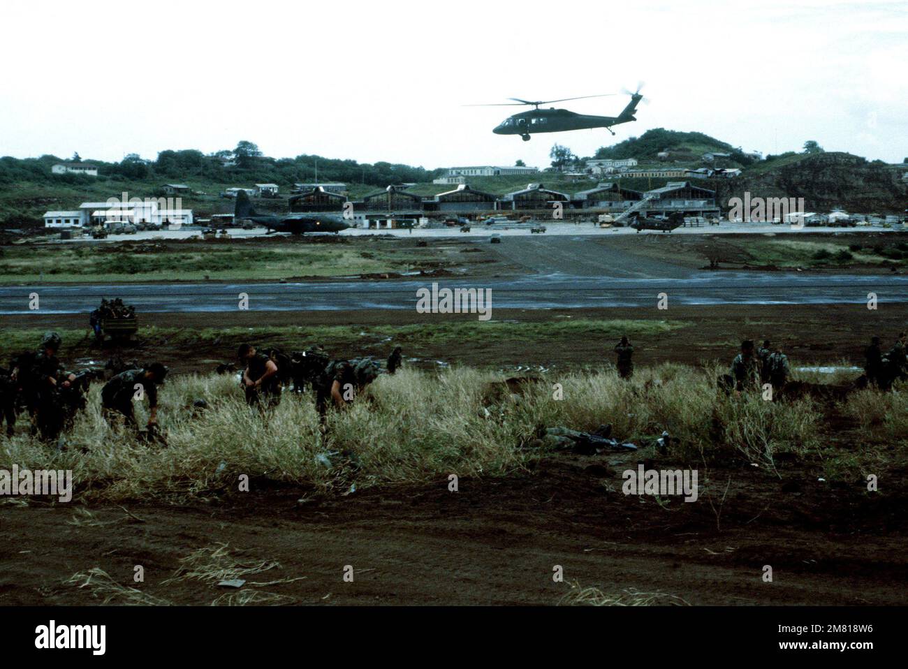 Members of the 82nd Airborne Division prepare to go on patrol during the multi-service ...