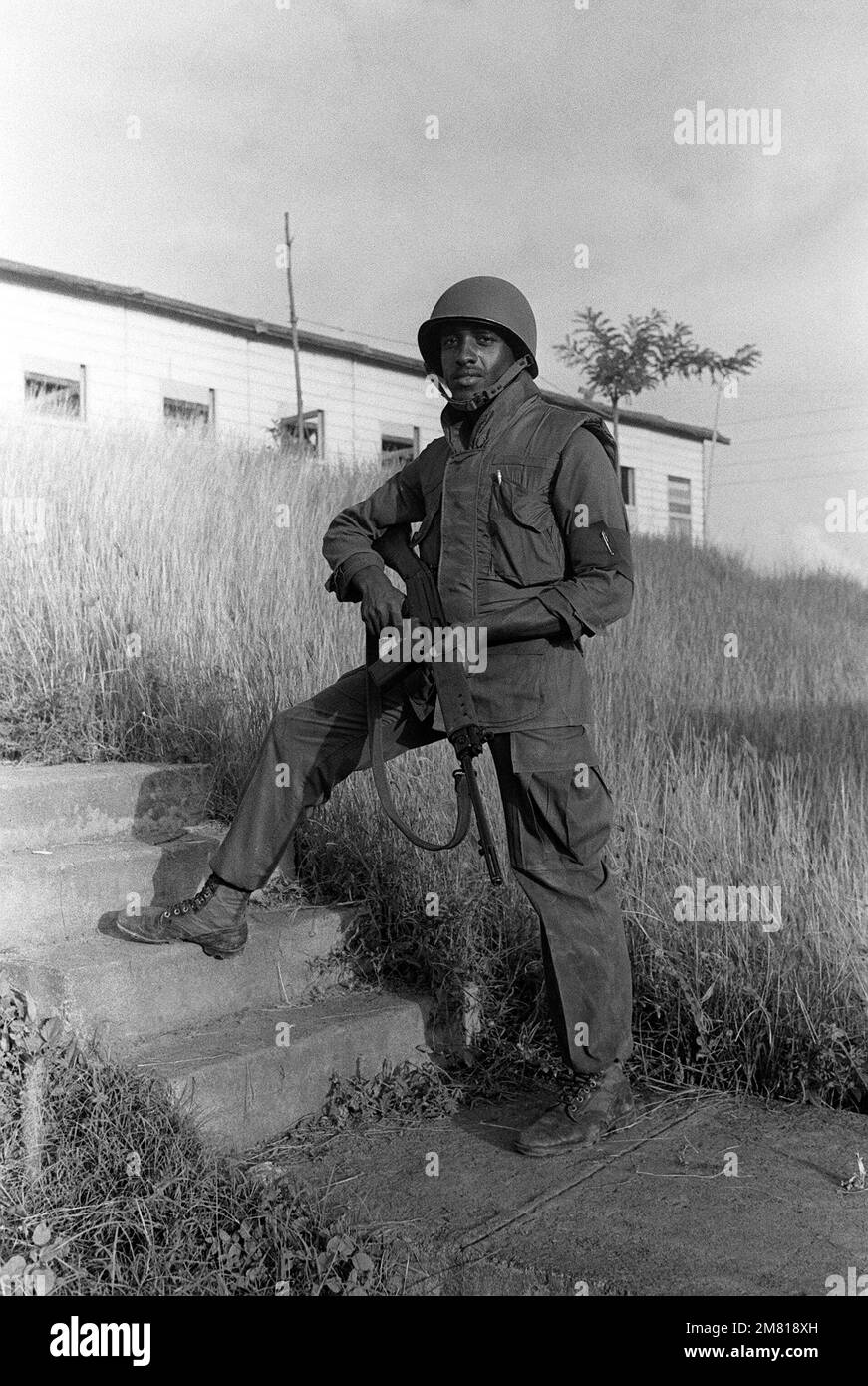 A member of the Eastern Caribbean Defense Force participating in ...