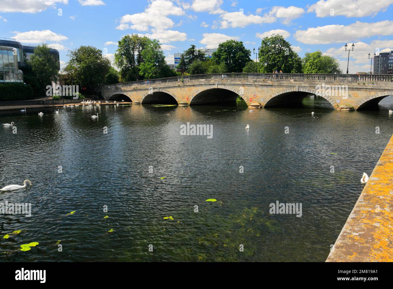 Stone bridge over river Great Ouse embankment, Bedford town ...