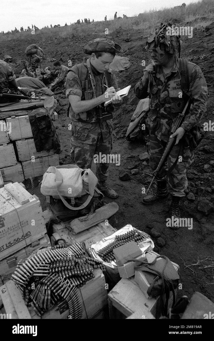 A US Air Force photographer interviews a member of the 82nd Airborne ...