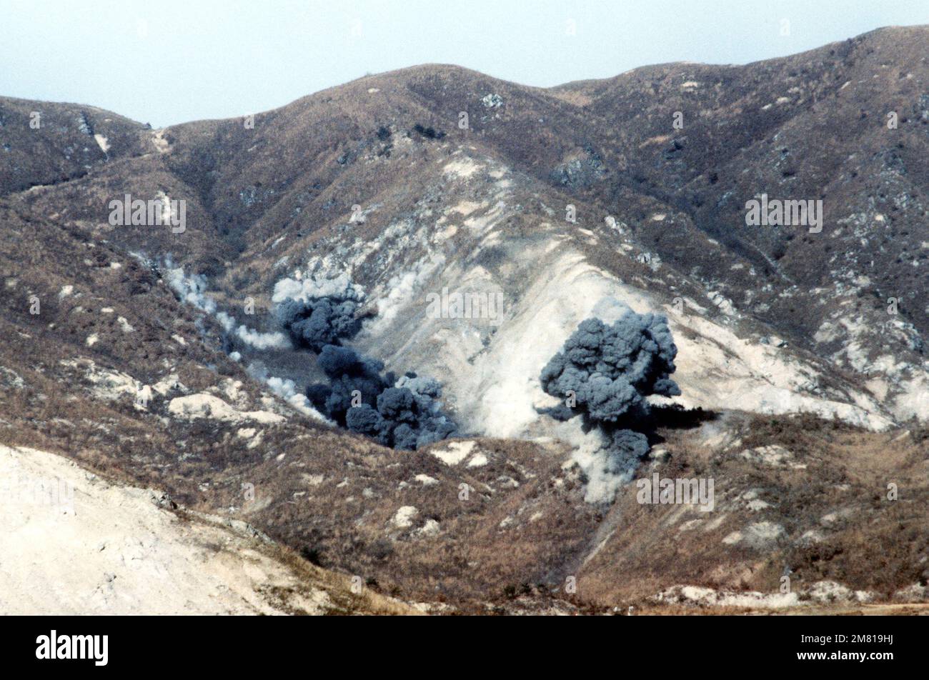 Artillery rounds explode in the impact area at Nightmare Range during a ...