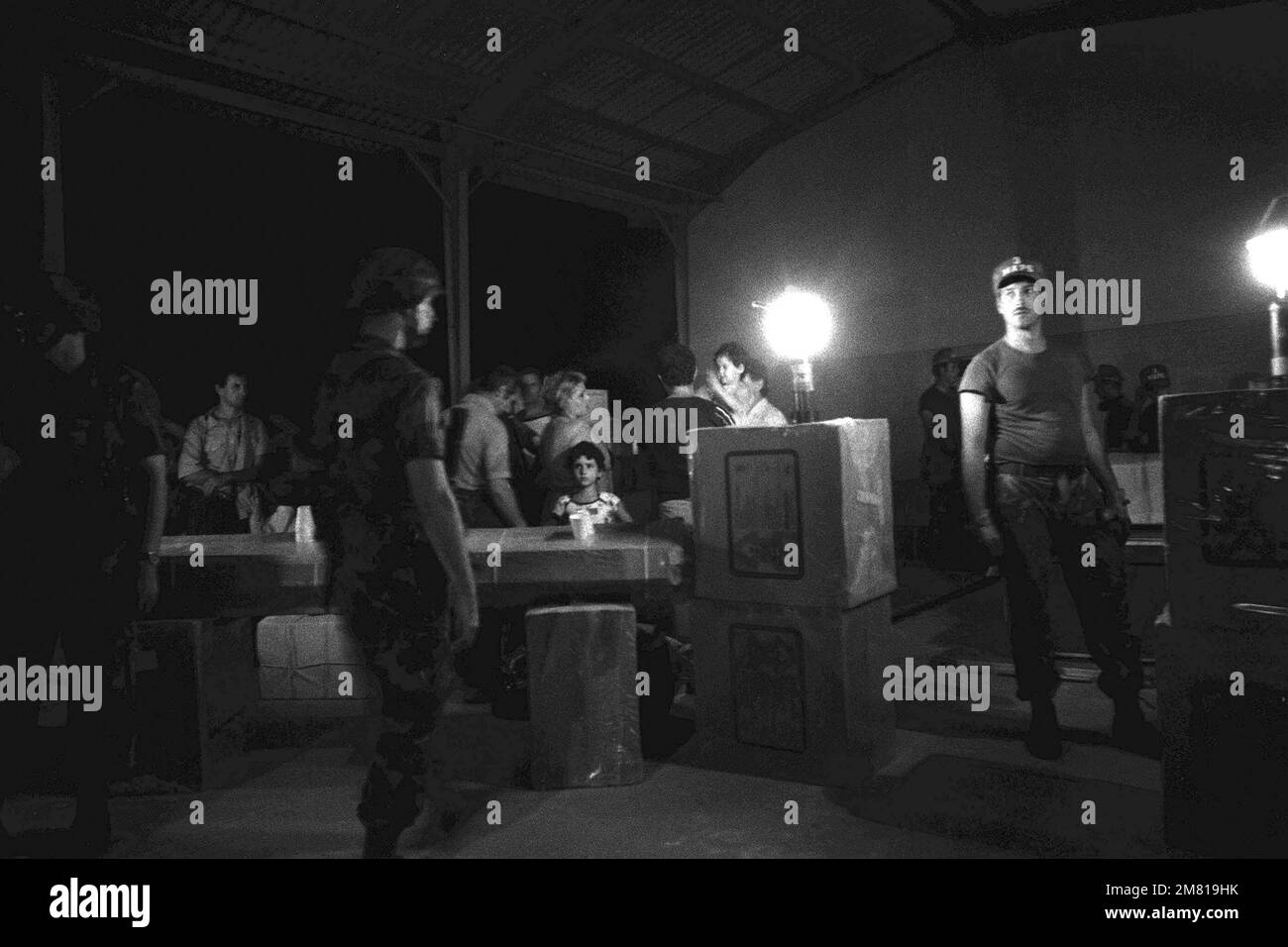 US servicemen screen Cuban nationals at the US Joint Detention Center ...