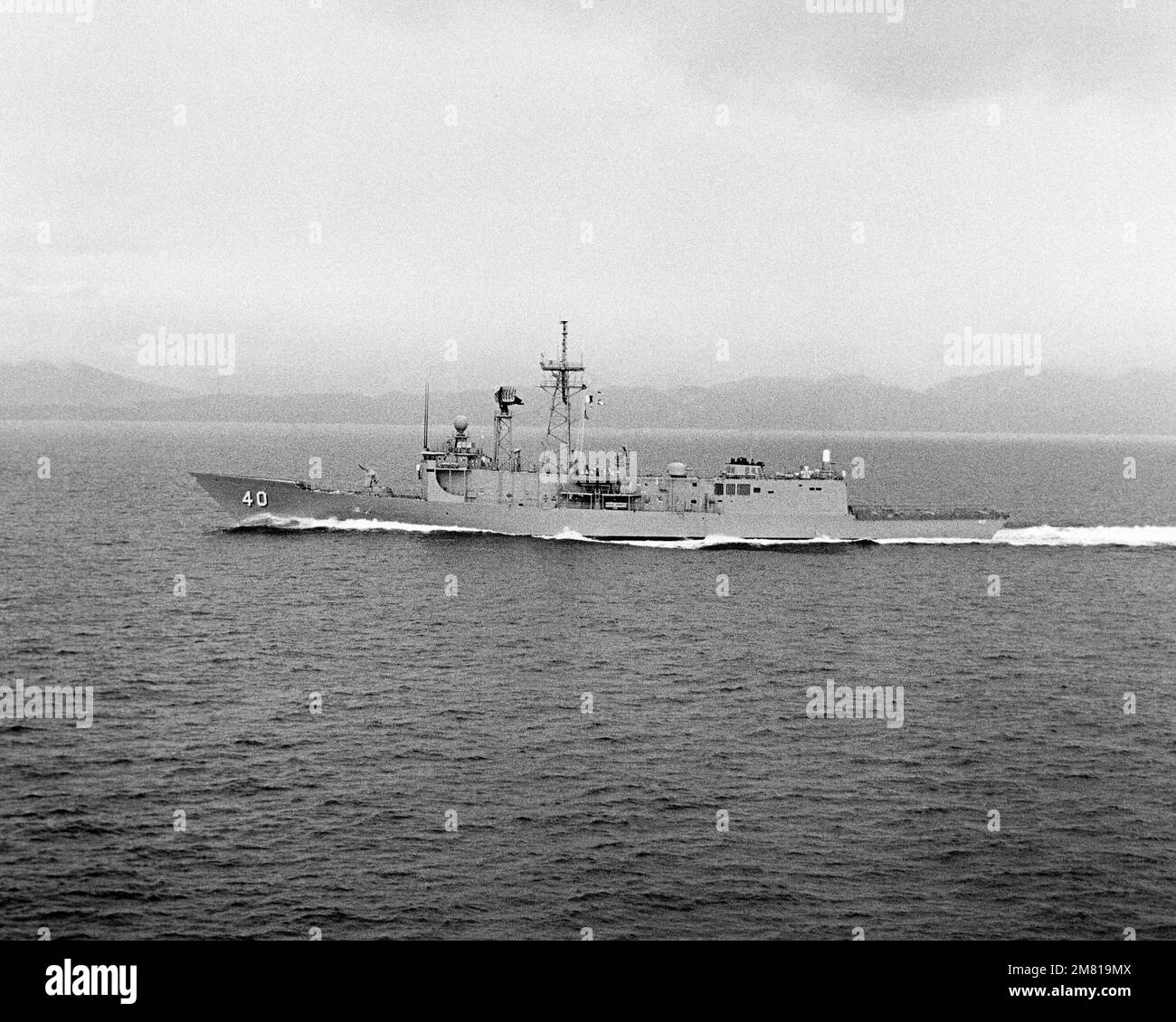 A port beam view of the guided missile frigate HALYBURTON (FFG 40 ...
