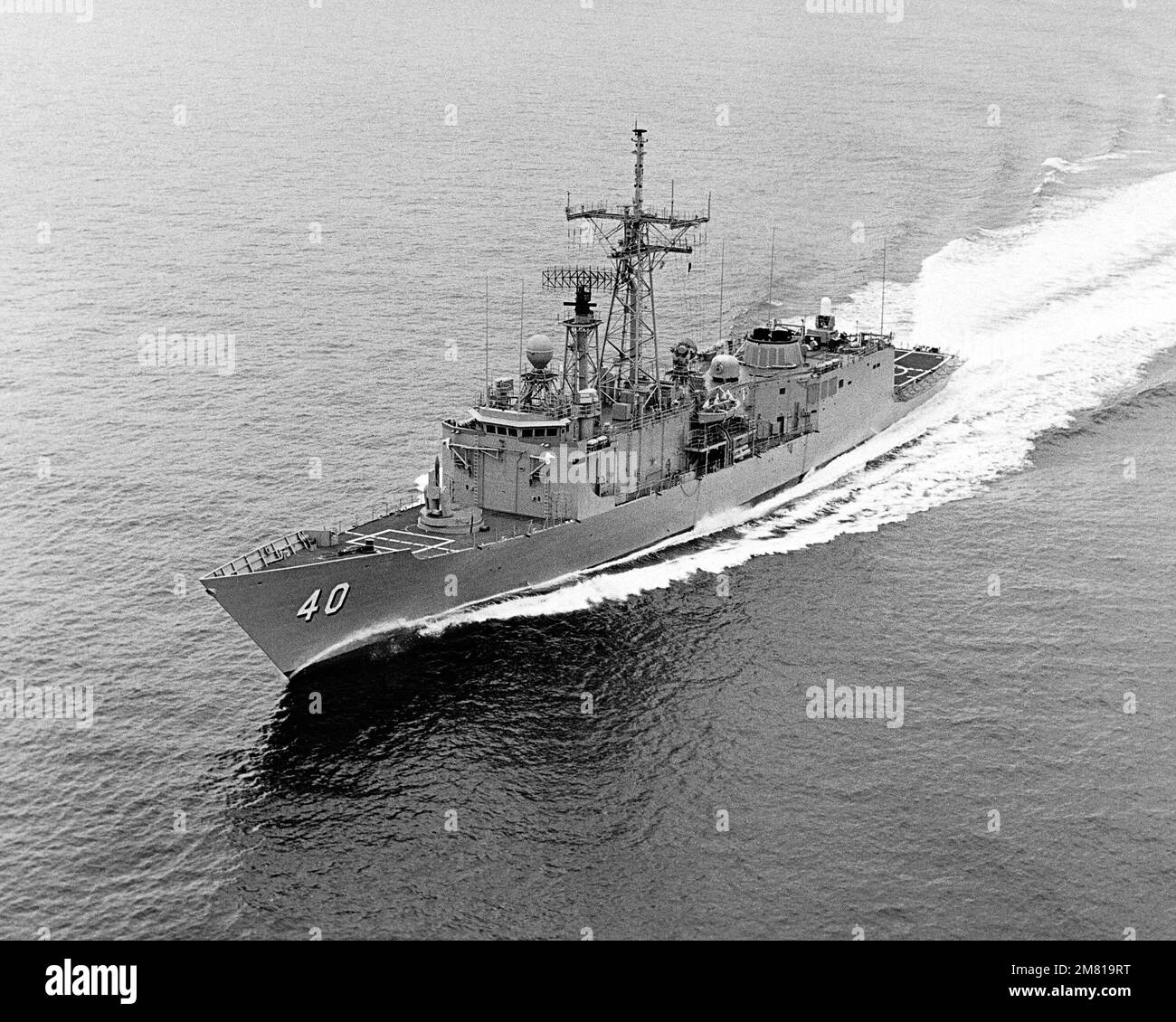 An elevated port bow view of the guided missile frigate HALYBURTON (FFG ...