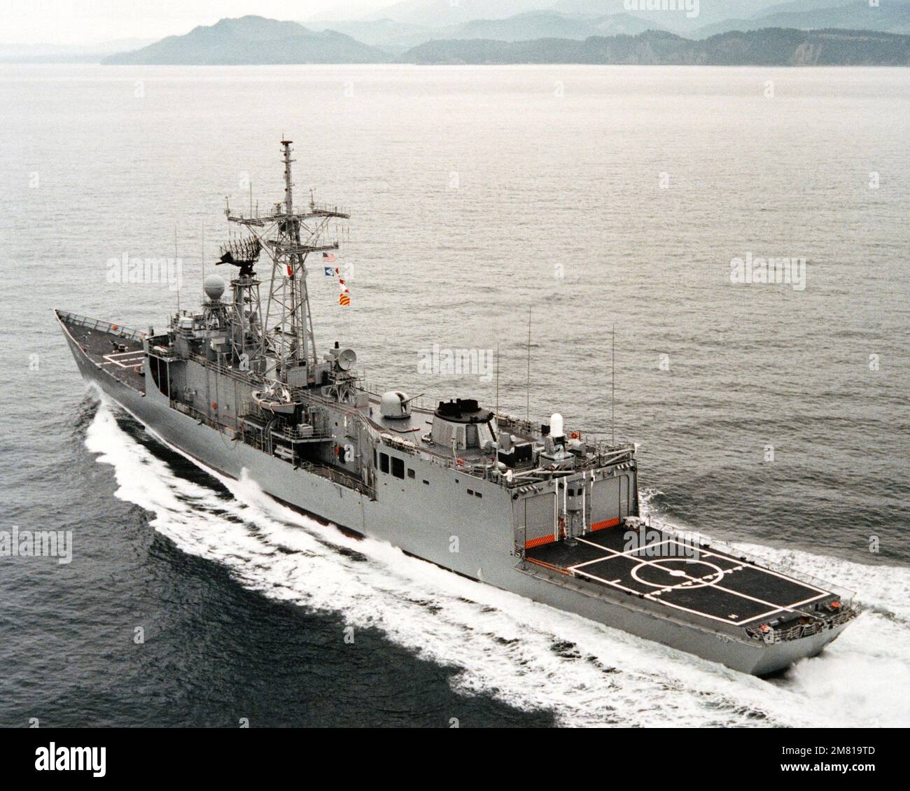 An aerial port quarter view of the guided missile frigate HALYBURTON ...