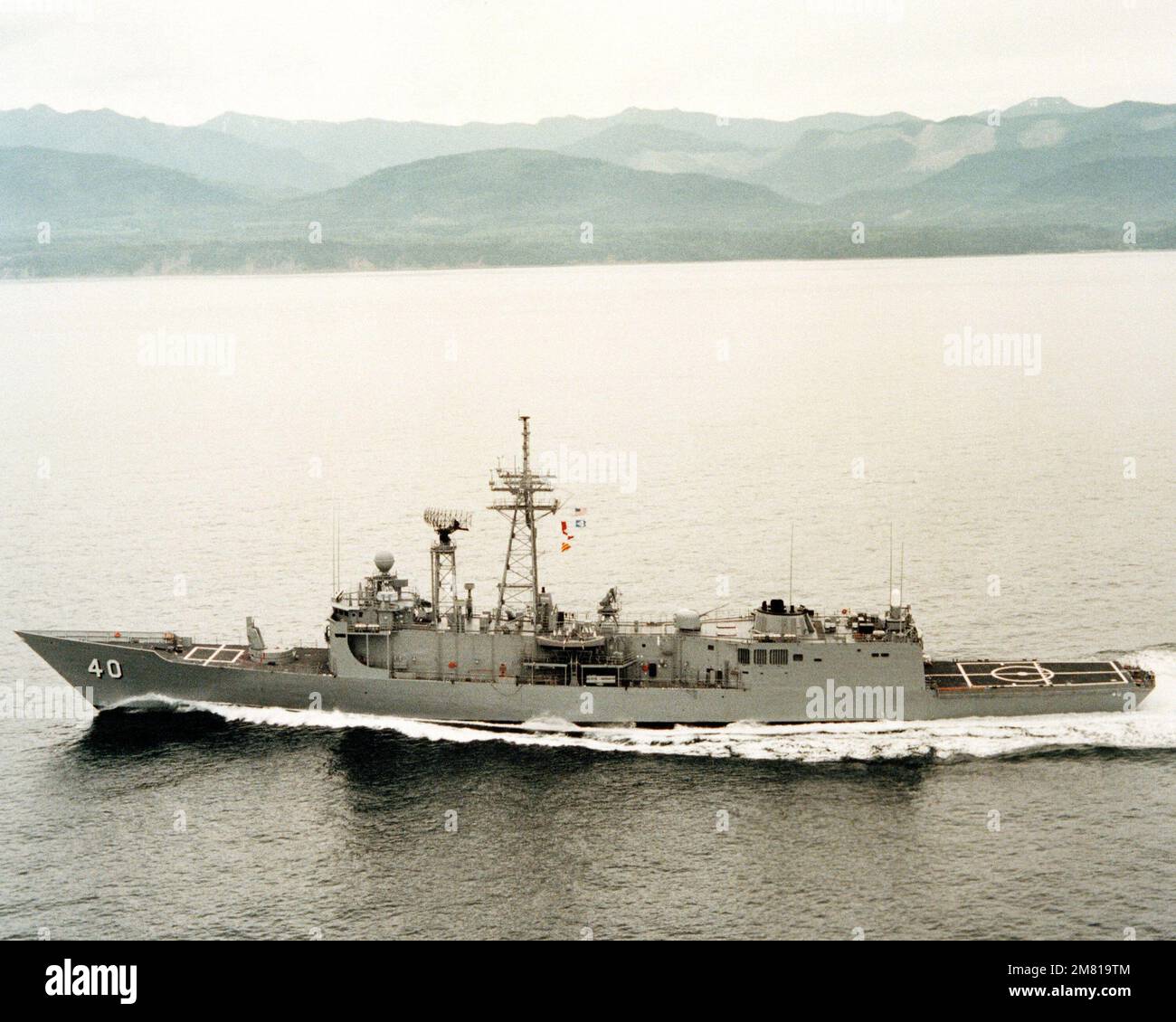 An aerial port beam view of the guided missile frigate HALYBURTON (FFG ...