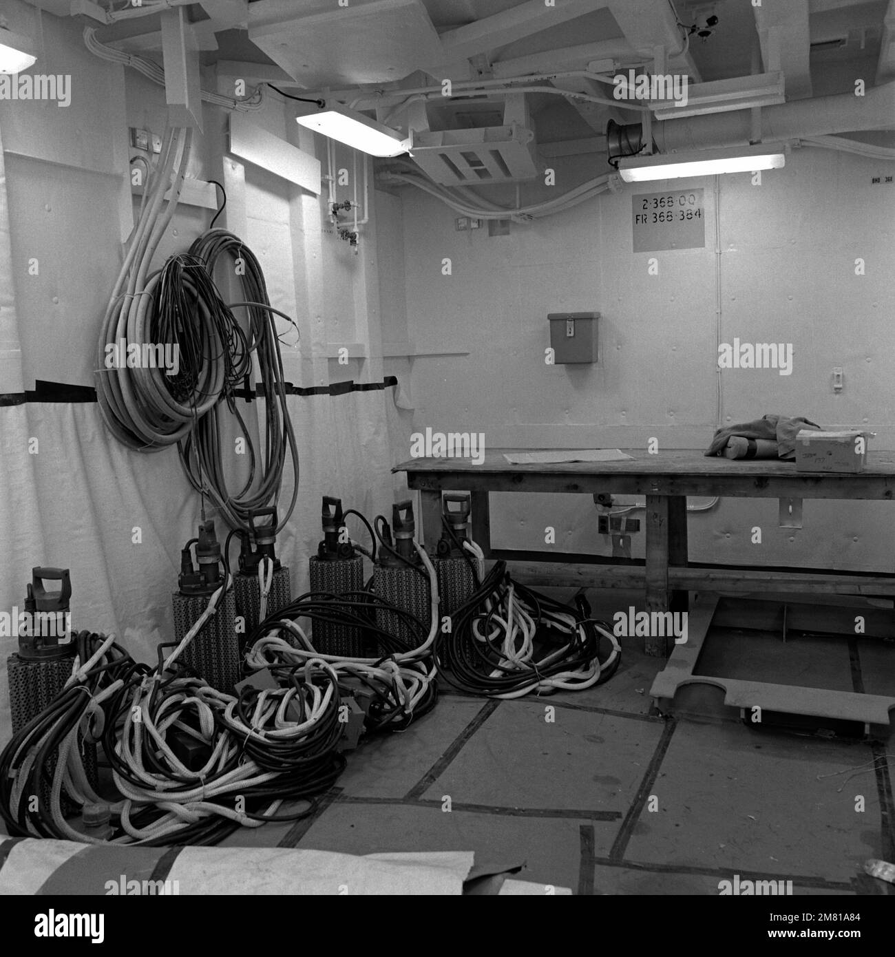 The helicopter hauldown and traverse machinery room aboard the guided ...
