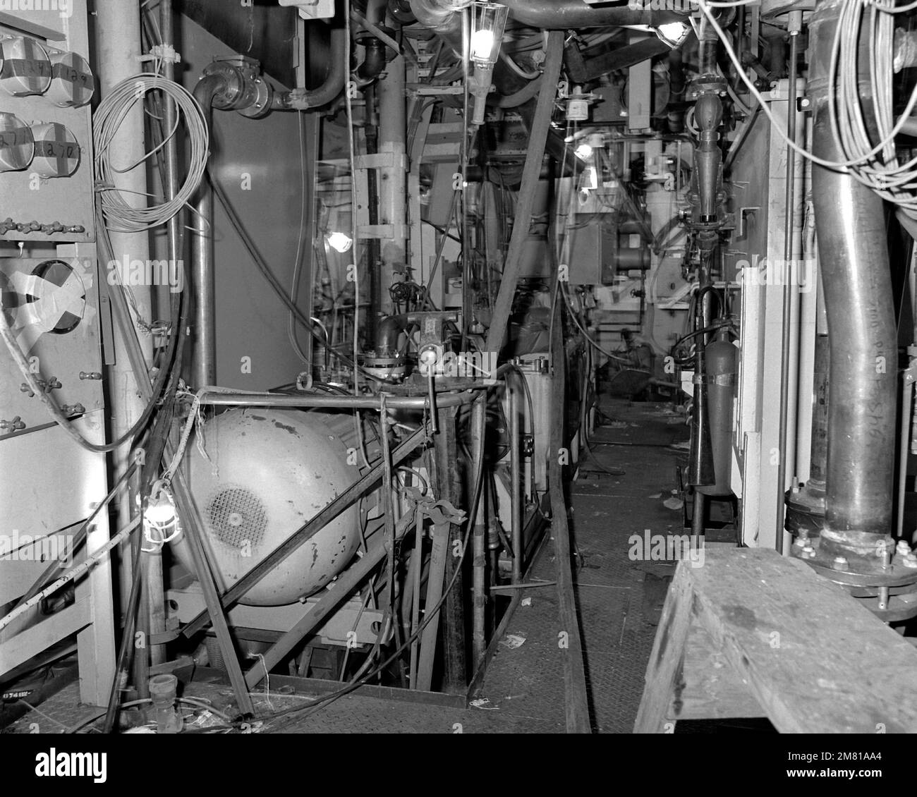 The lower level engine room aboard the guided missile frigate ROBERT G ...