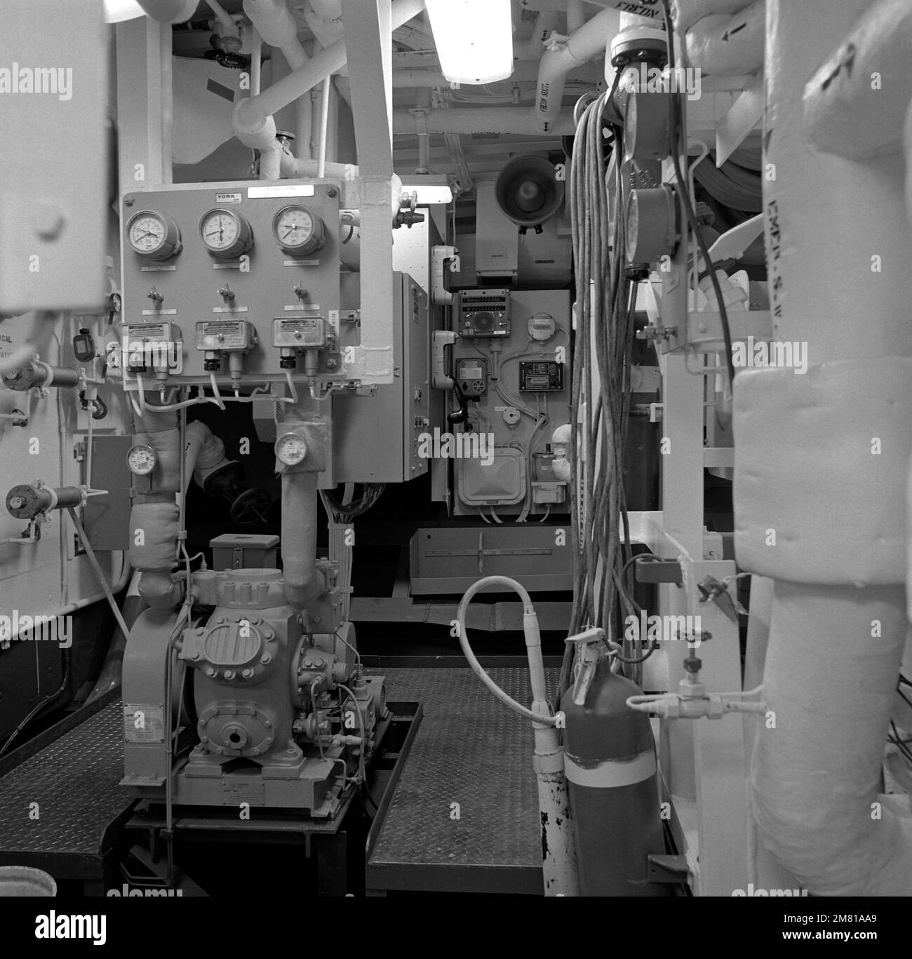 The No. 1 auxiliary machinery room aboard the guided missile frigate ...