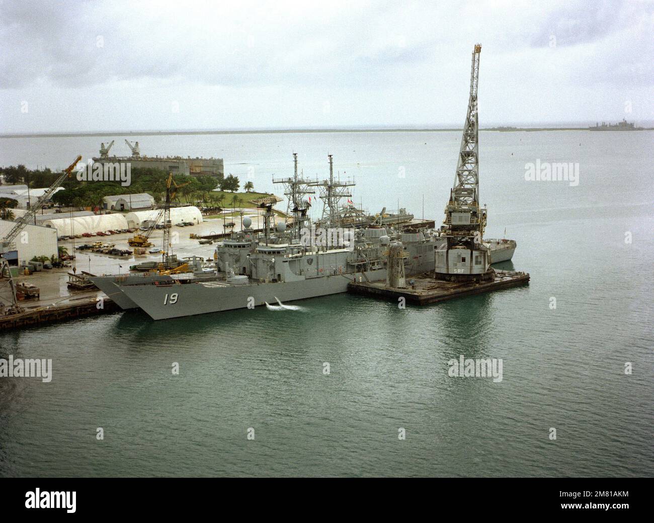 A partial port view of the guided missile frigate USS JOHN A. MOORE (FFG-19) docked at the U.S ...