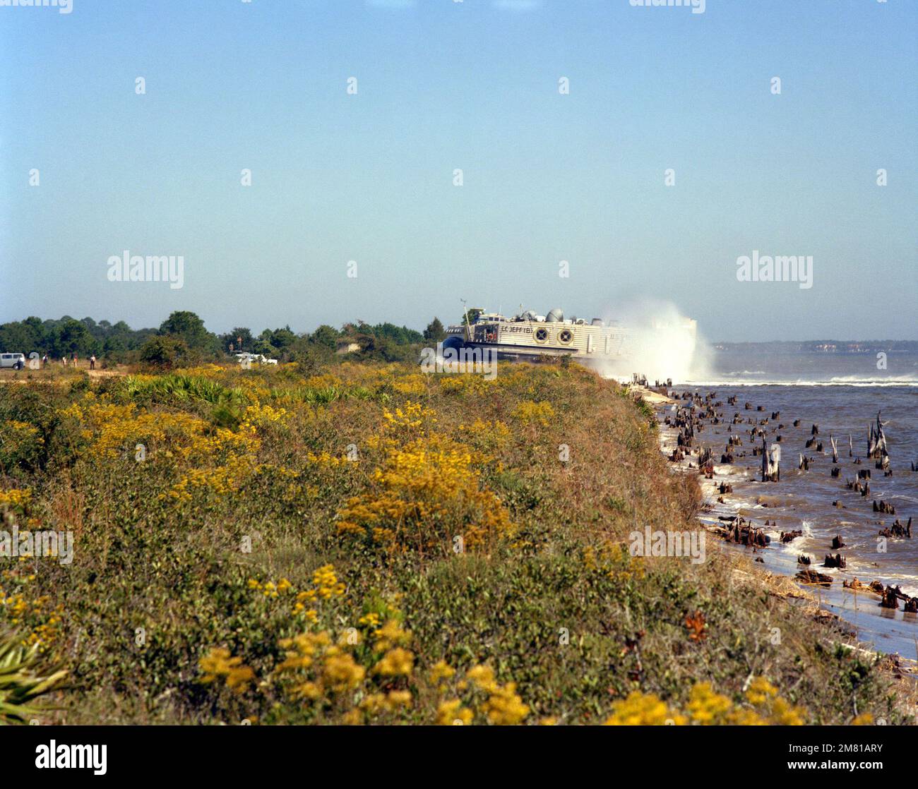 The amphibious assault landing craft (AALC) "Jeff B" comes ashore at ...