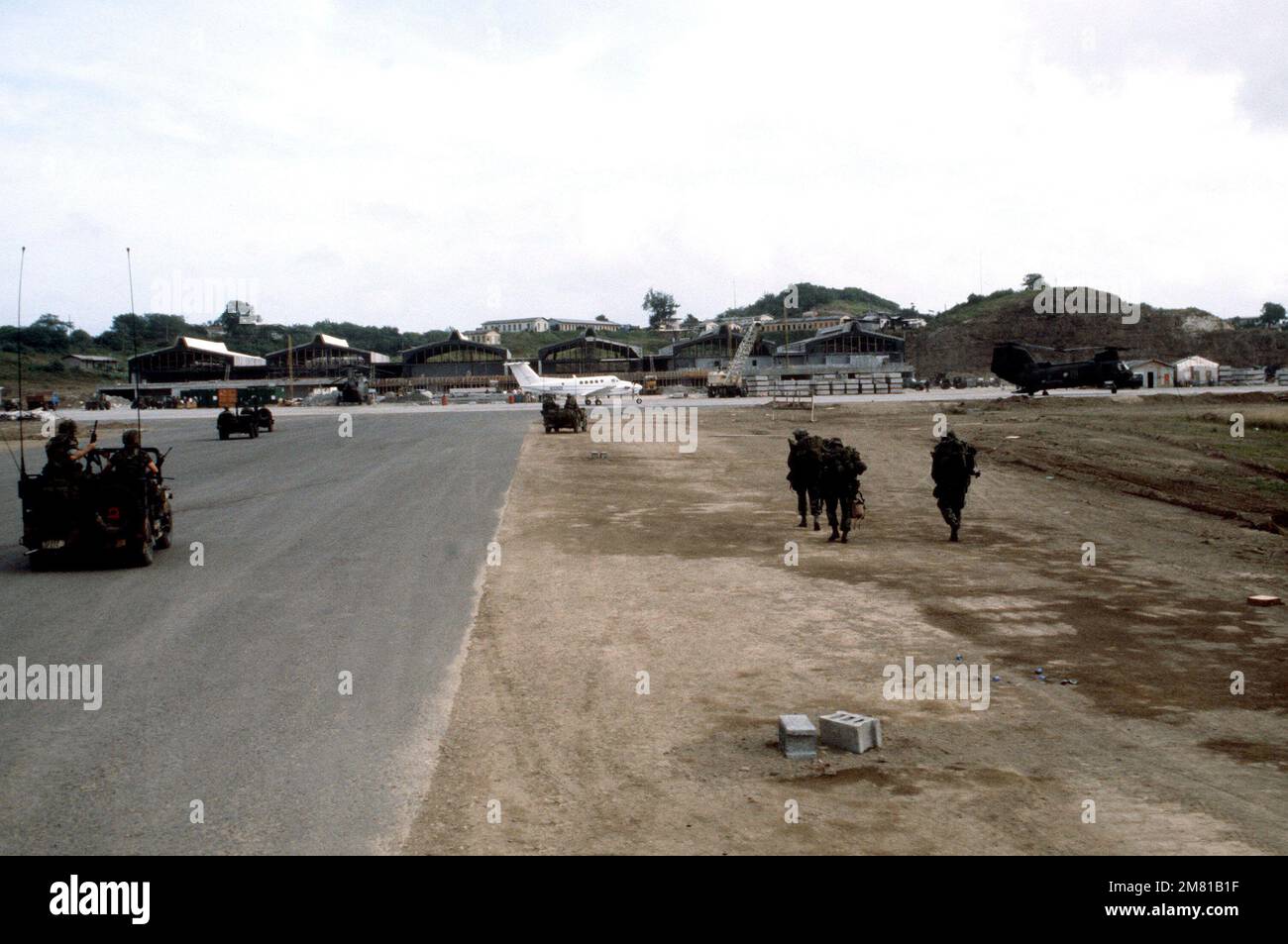 An overall view of the airport during Operation URGENT FURY. A CH-46 ...