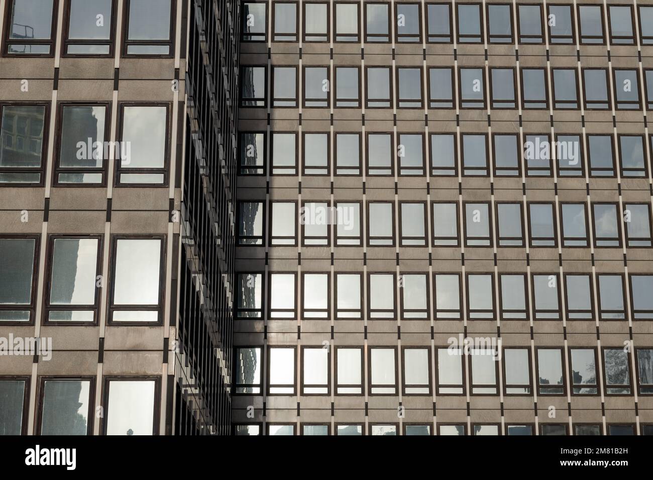Architectural details of a modern building with reflection glass ...