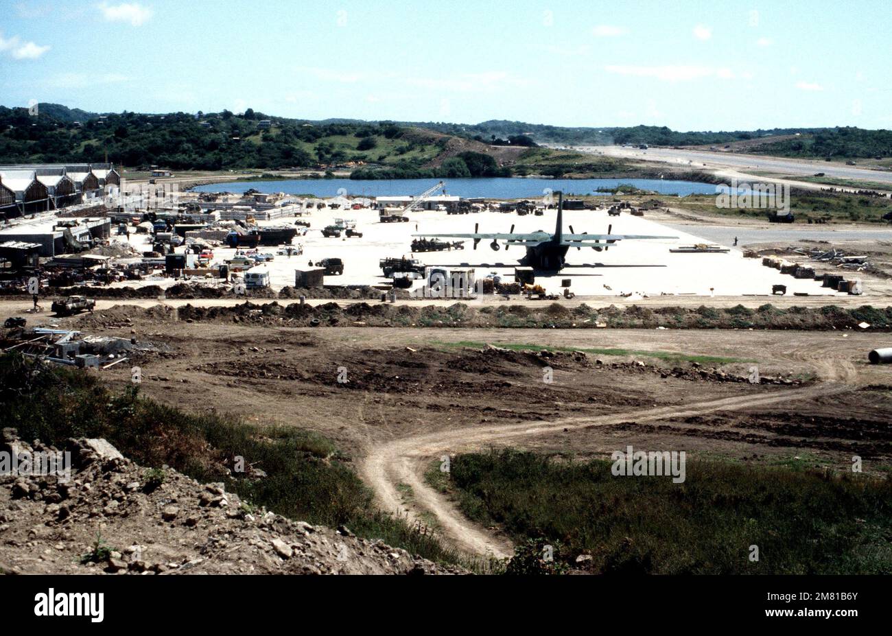 An overall view of Point Salines airport with a C-130 Hercules aircraft ...