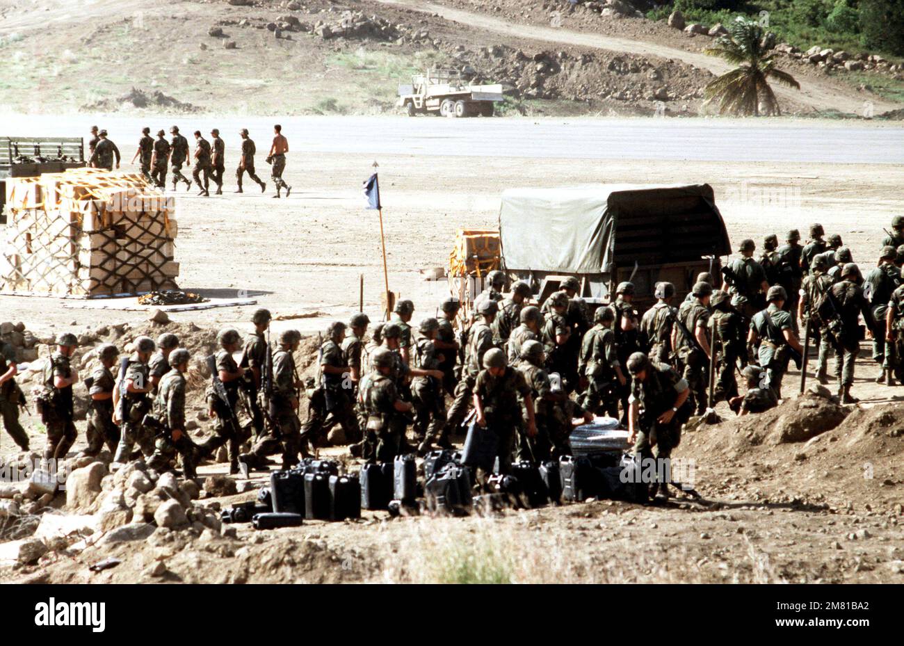 Members of the 82nd Airborne Division form ranks as they prepare to ...
