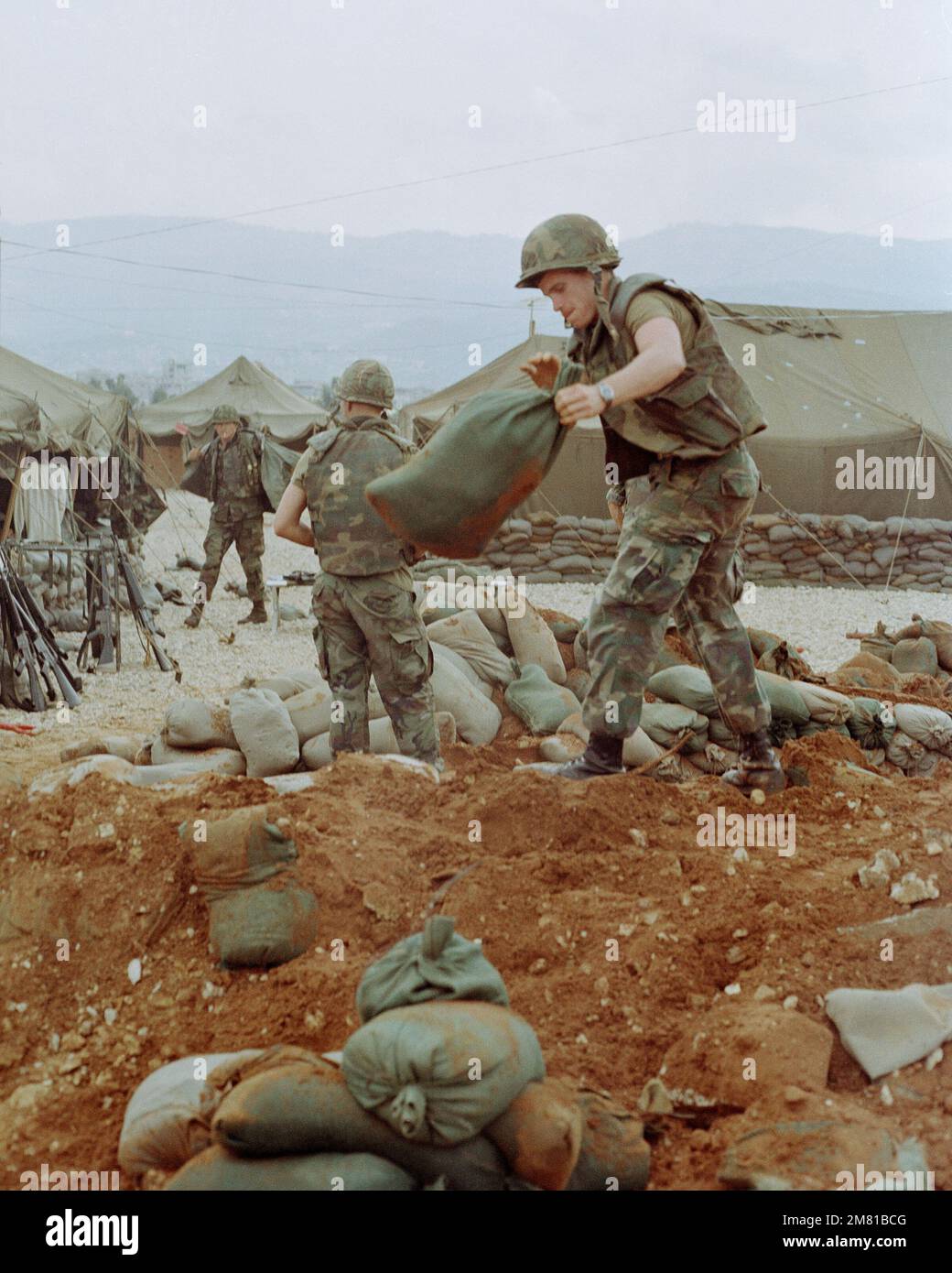 Marines of the 24th Marine Amphibious Unit rebuild bunkers that were ...