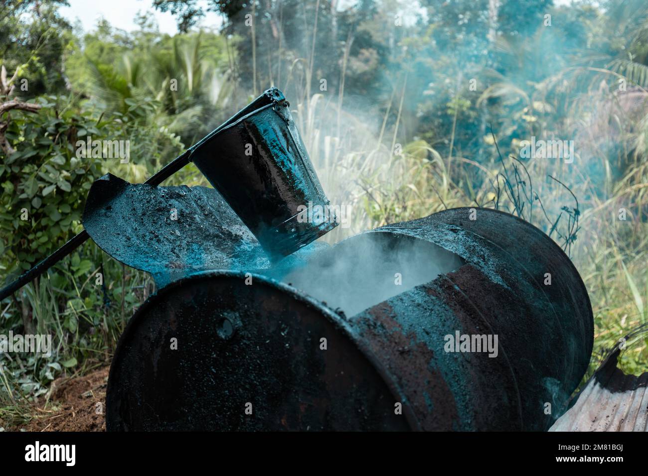 Traditional Heating up tar landscape photo Stock Photo - Alamy