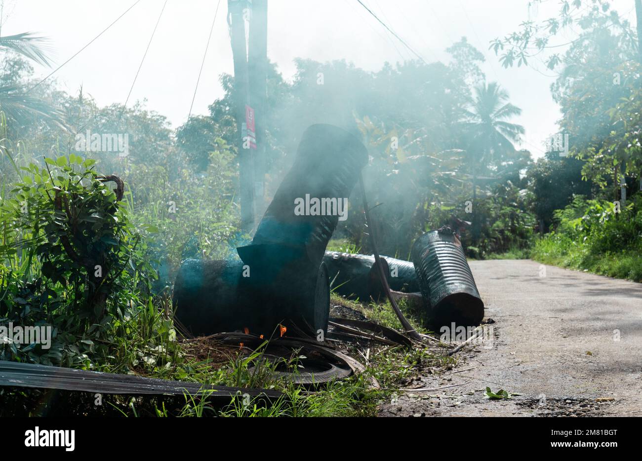 Traditional Heating up tar landscape photo Stock Photo - Alamy