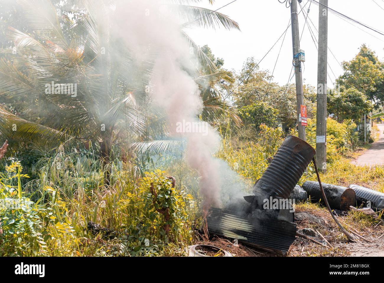 Traditional Heating up tar landscape photo Stock Photo - Alamy