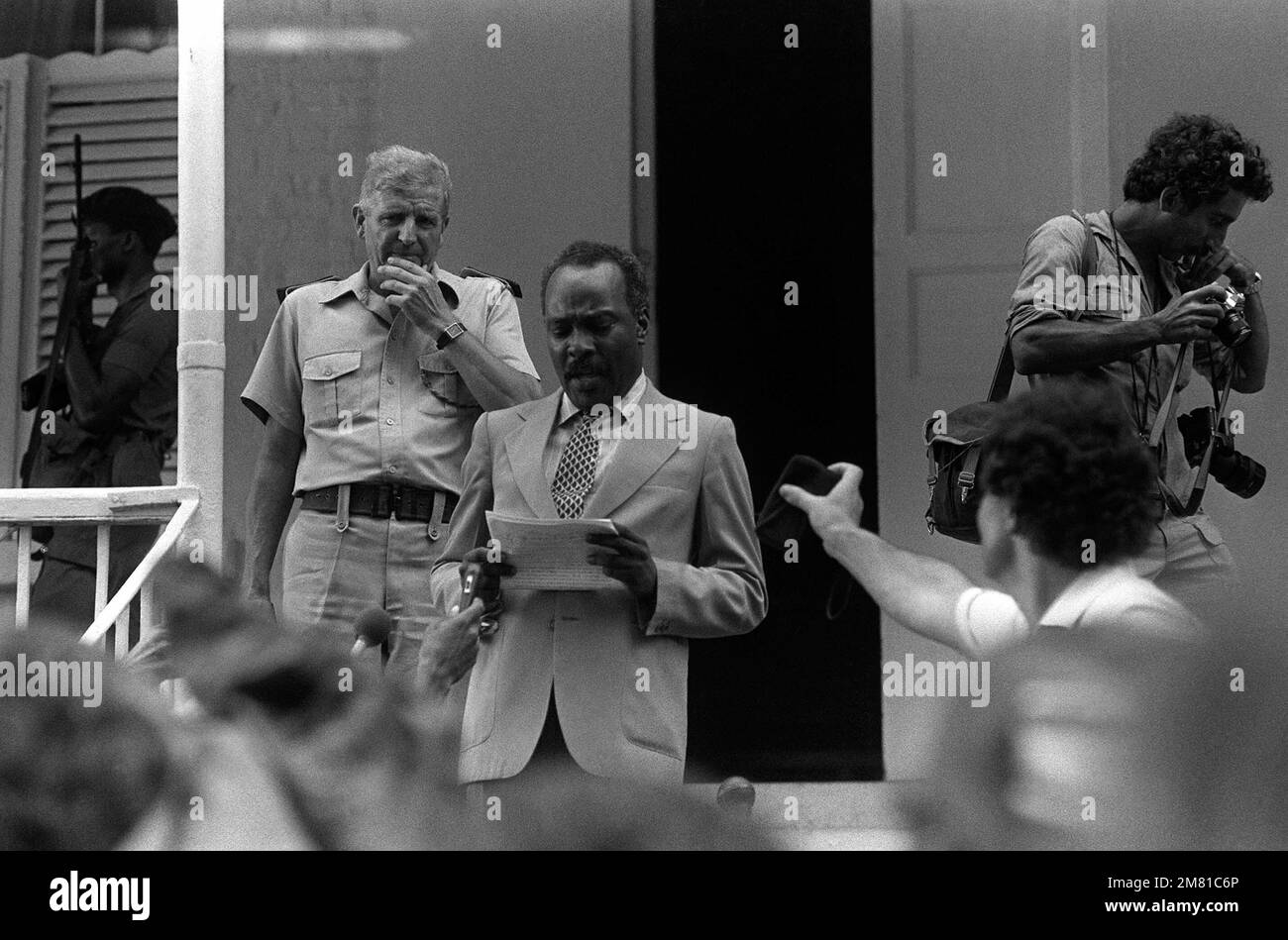 Governor-General Sir Paul Scoon speaks to members of the media after ...