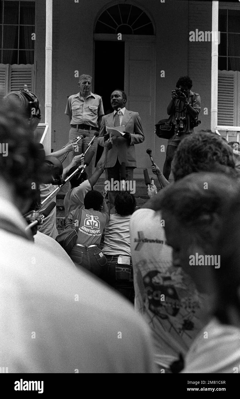 Governor-General Sir Paul Scoon speaks to members of the media after ...