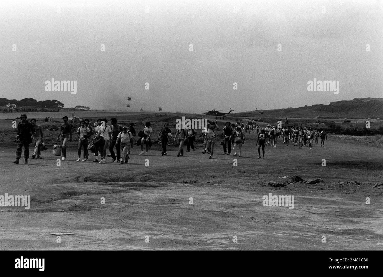 American medical students walk on the runway toward the US military ...