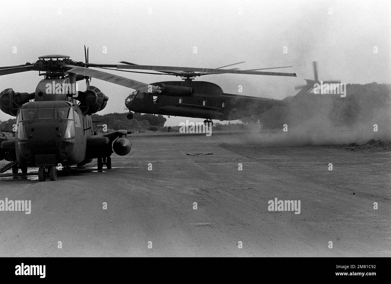 Two CH-53 Super Stallion helicopters in use during Operation URGENT ...