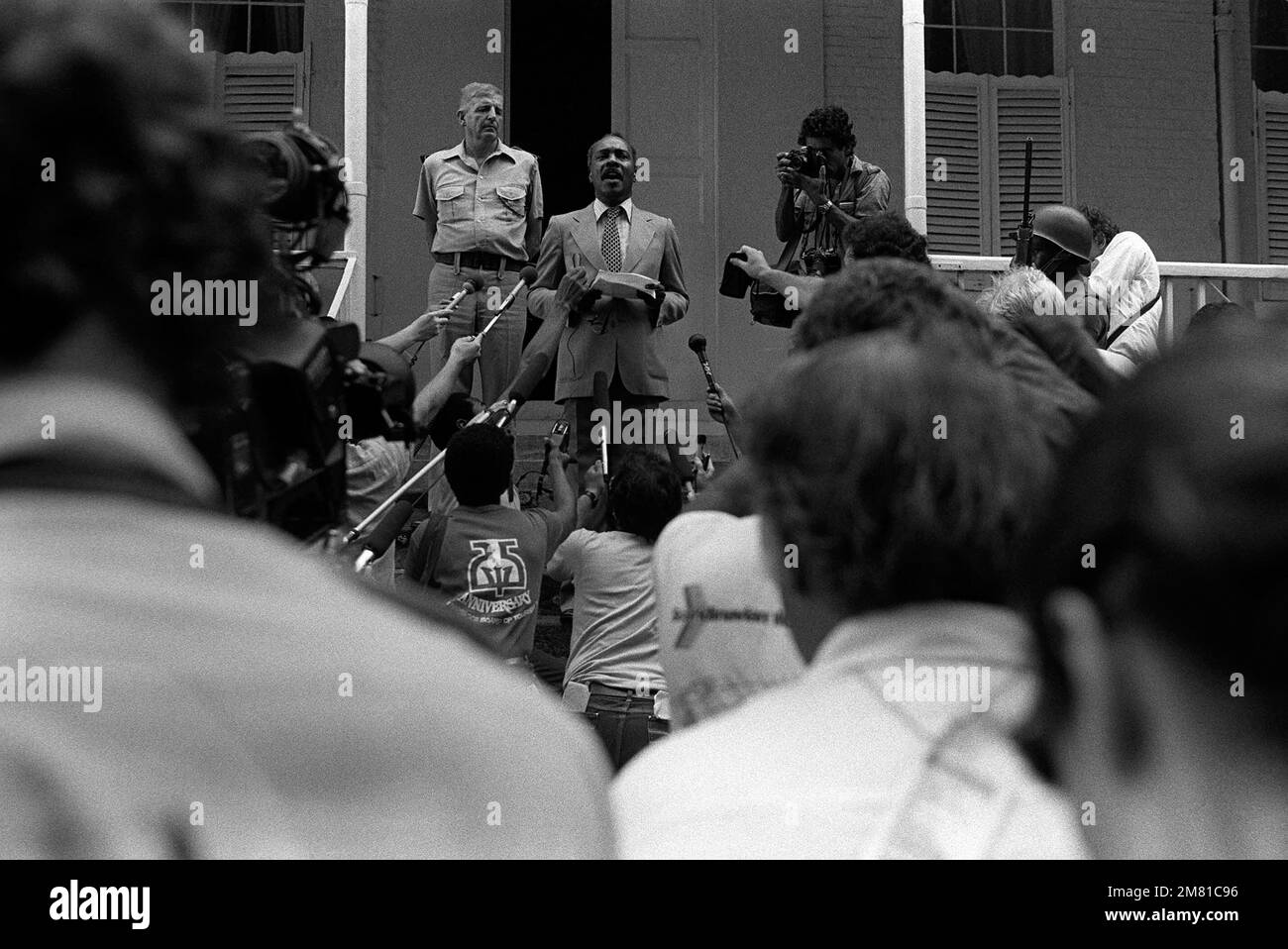 Governor-General Sir Paul Scoon speaks to members of the media after ...
