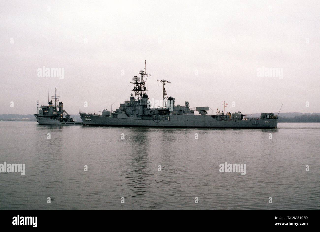 A port beam view of the decommissioned destroyer BARRY (DD 933) being ...