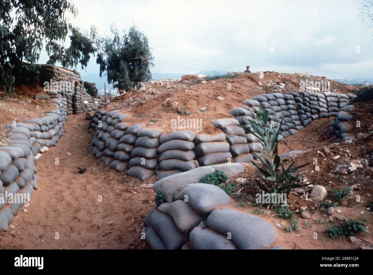 Sandbagged trenches at the command post bunker of Company G, 2nd ...