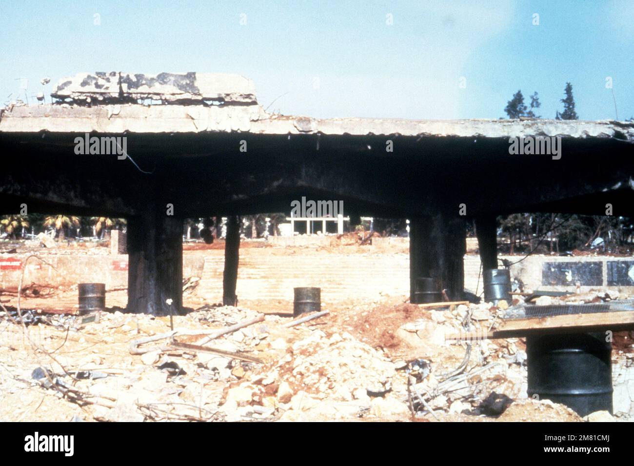 Debris marks the site of the Marine Battalion Landing Team headquarters ...