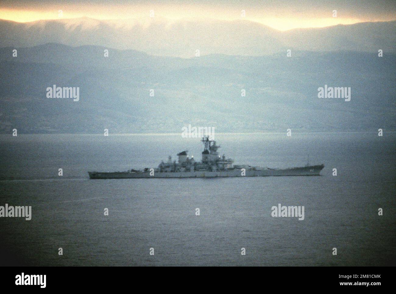A starboard beam view of the battleship USS NEW JERSEY (BB 62) underway ...
