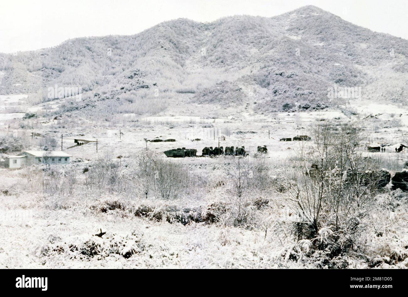 Light snow covers a Marine base camp during Operation BEAR HUNT '84 ...